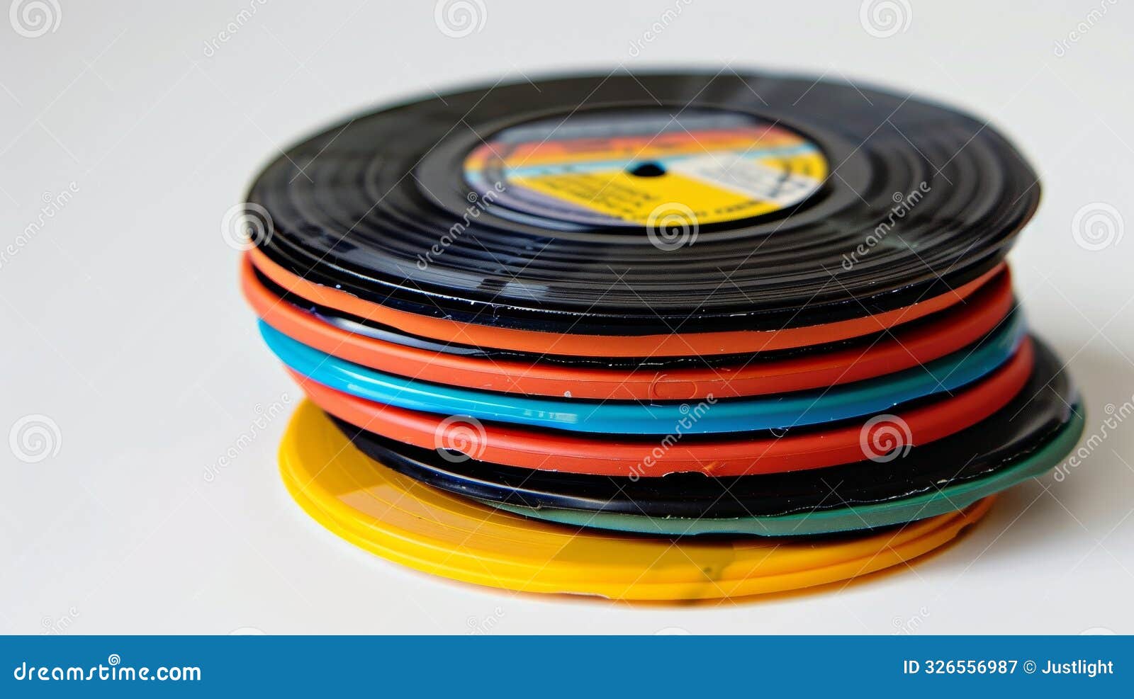 A Stack of Multicolored Plastic Record Coasters Featuring Different ...