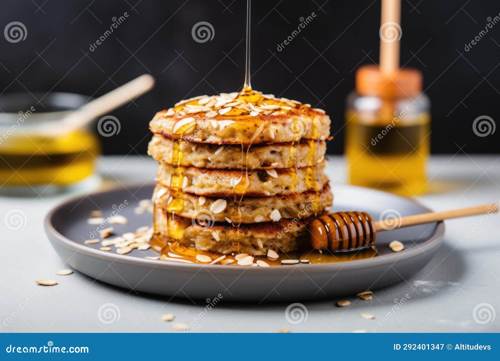 A Stack of Multigrain Pancakes with Honey Drizzle on a Plate Stock ...