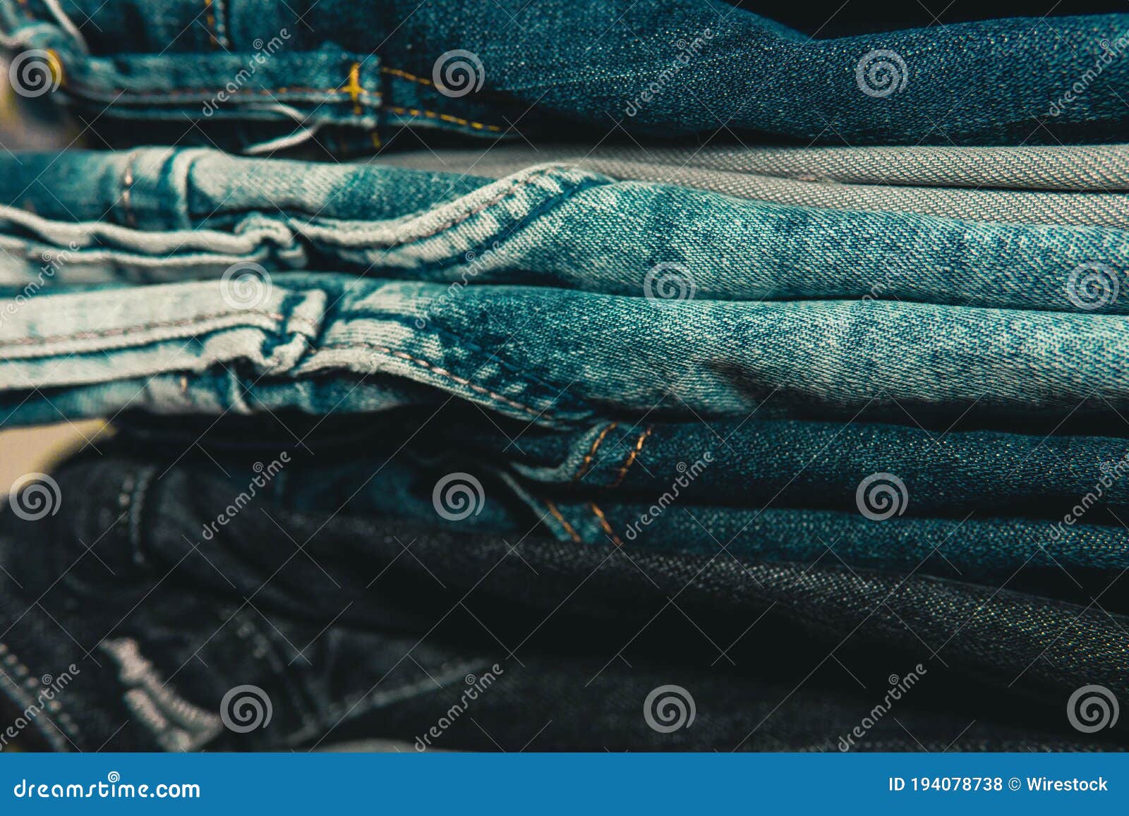 Stack of Neatly Folded Jeans Stock Photo - Image of closeup, fashion ...