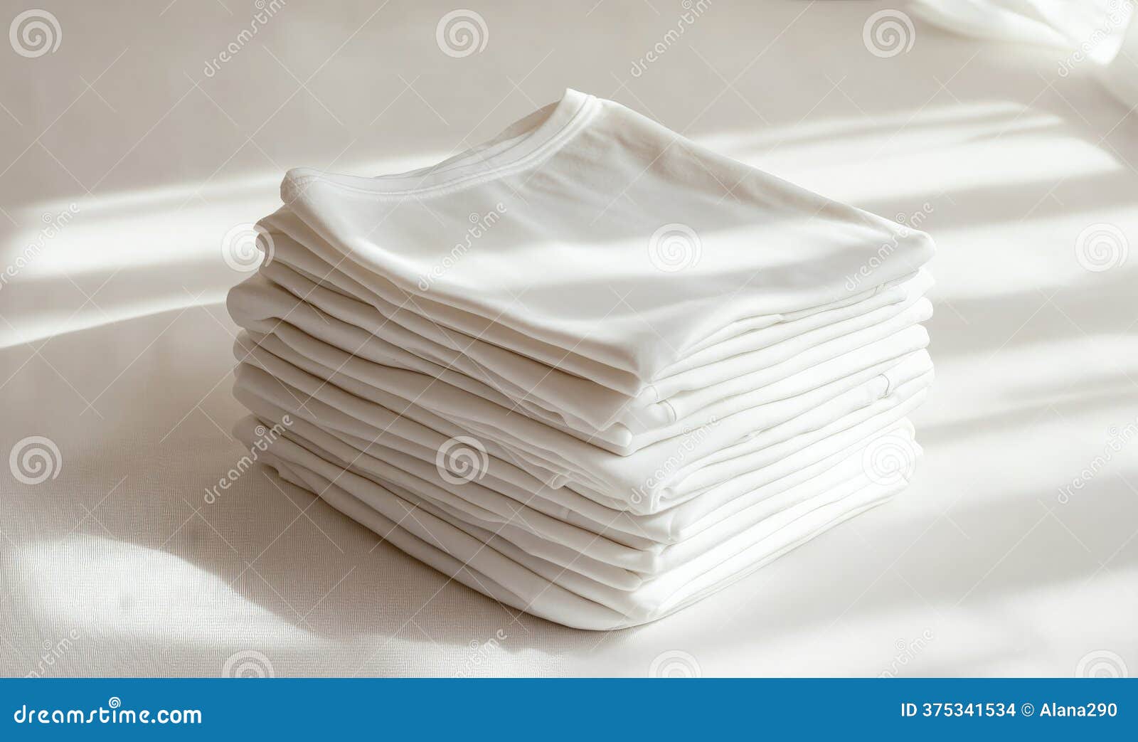 Neatly Folded Colorful Shirts Stacked On A Table Royalty-Free Stock ...