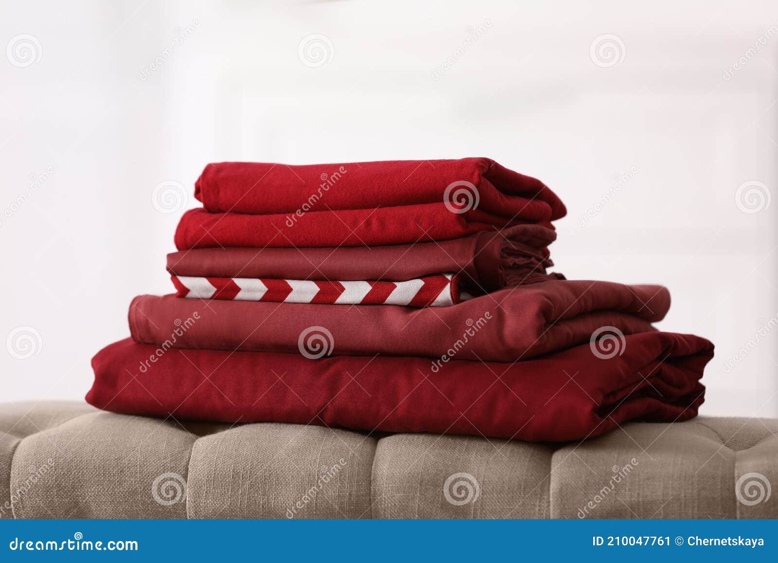 Stack of New Clean Folded Bed Linens on Bench Stock Image - Image of ...