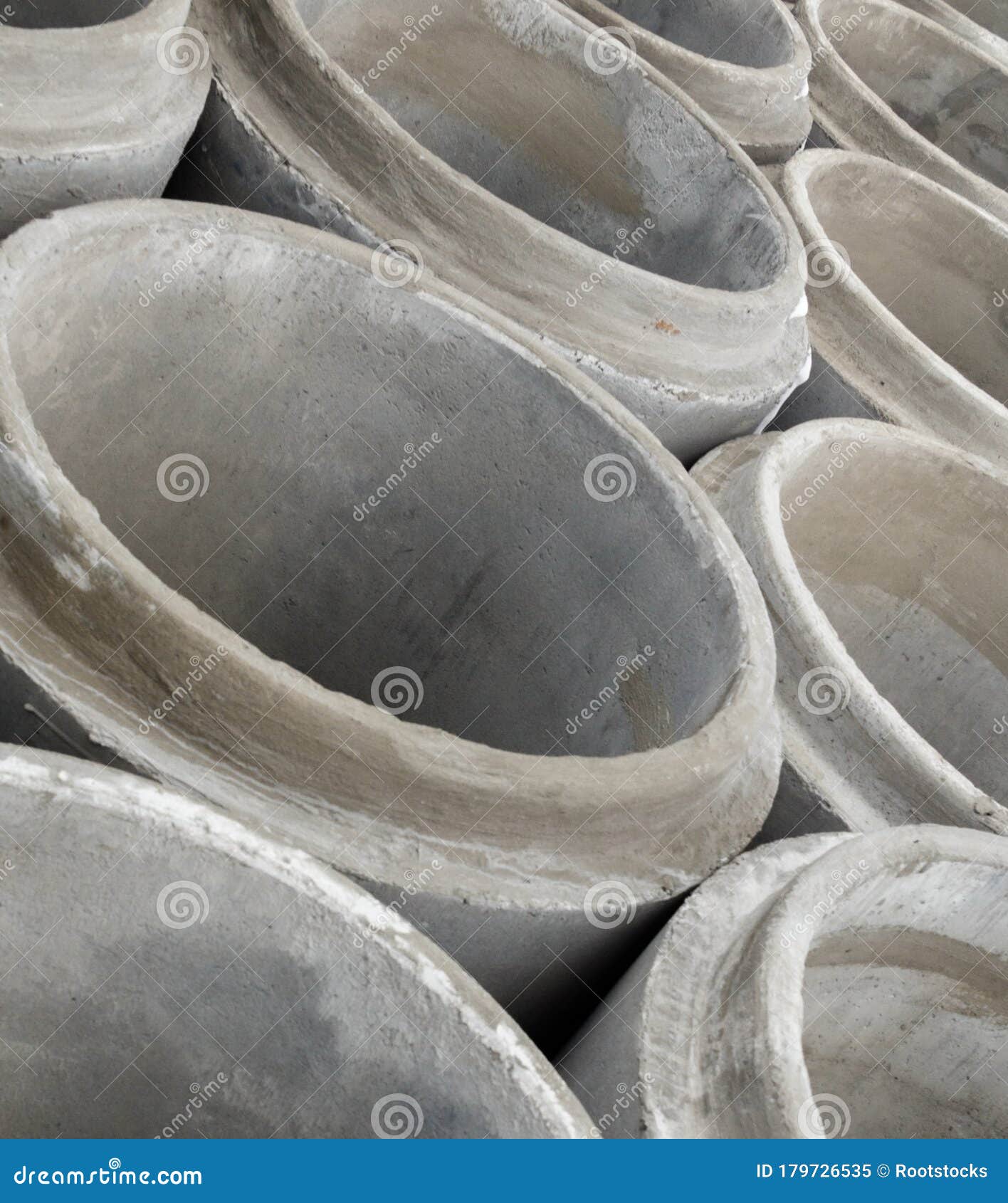 Stack of New Concrete Pipes Stock Image - Image of industrial ...