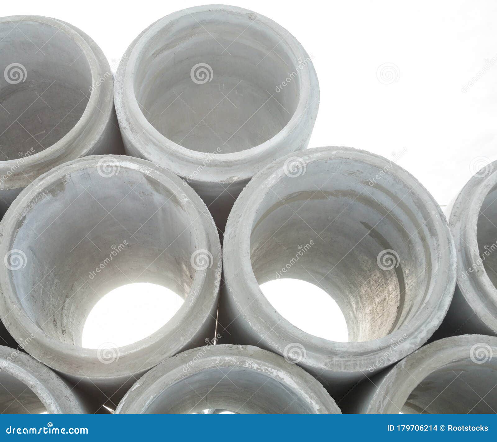 Stack of New Concrete Pipes Stock Photo - Image of construction ...