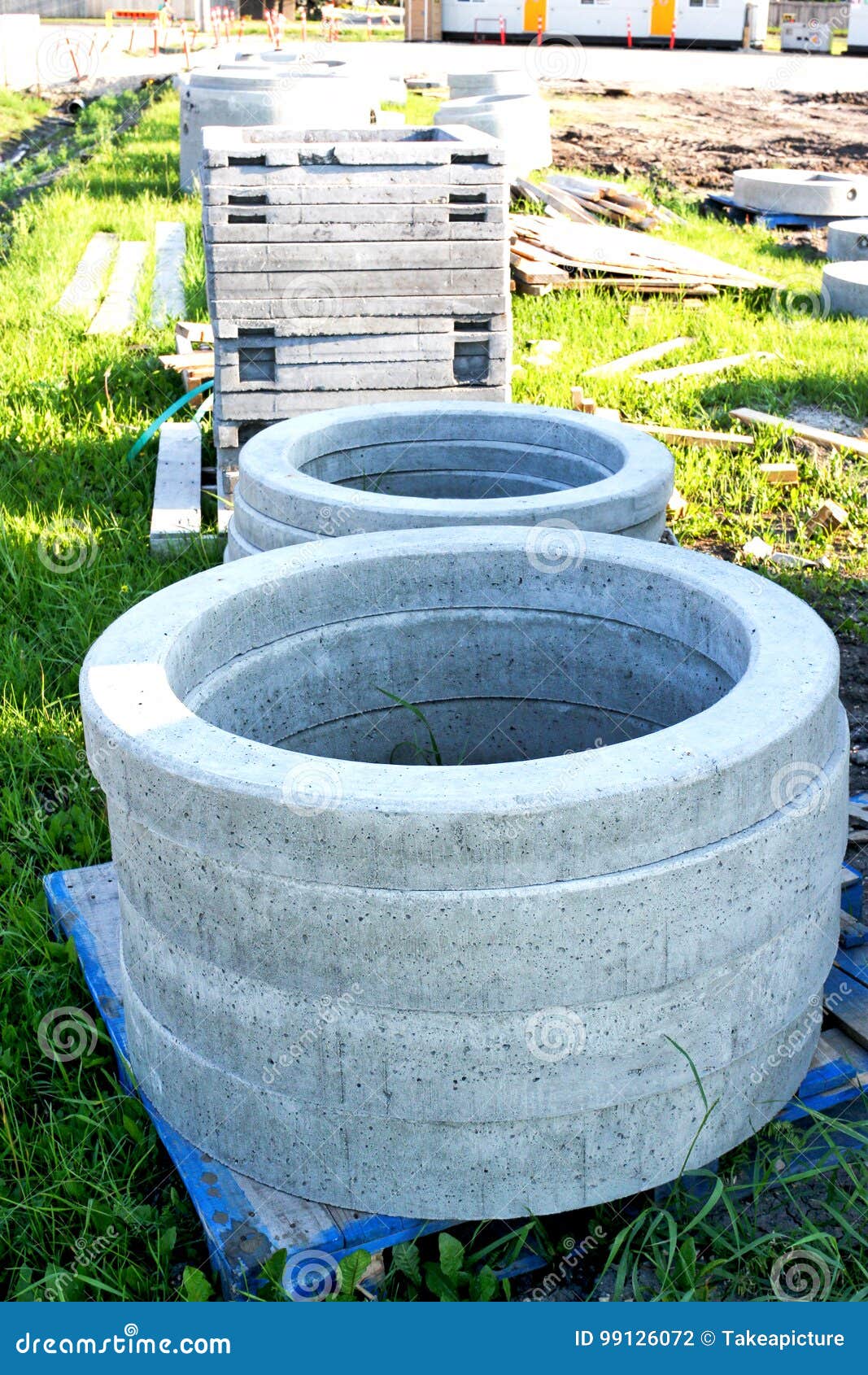 A Stack of New Concrete Rings Stock Photo - Image of rings, system ...