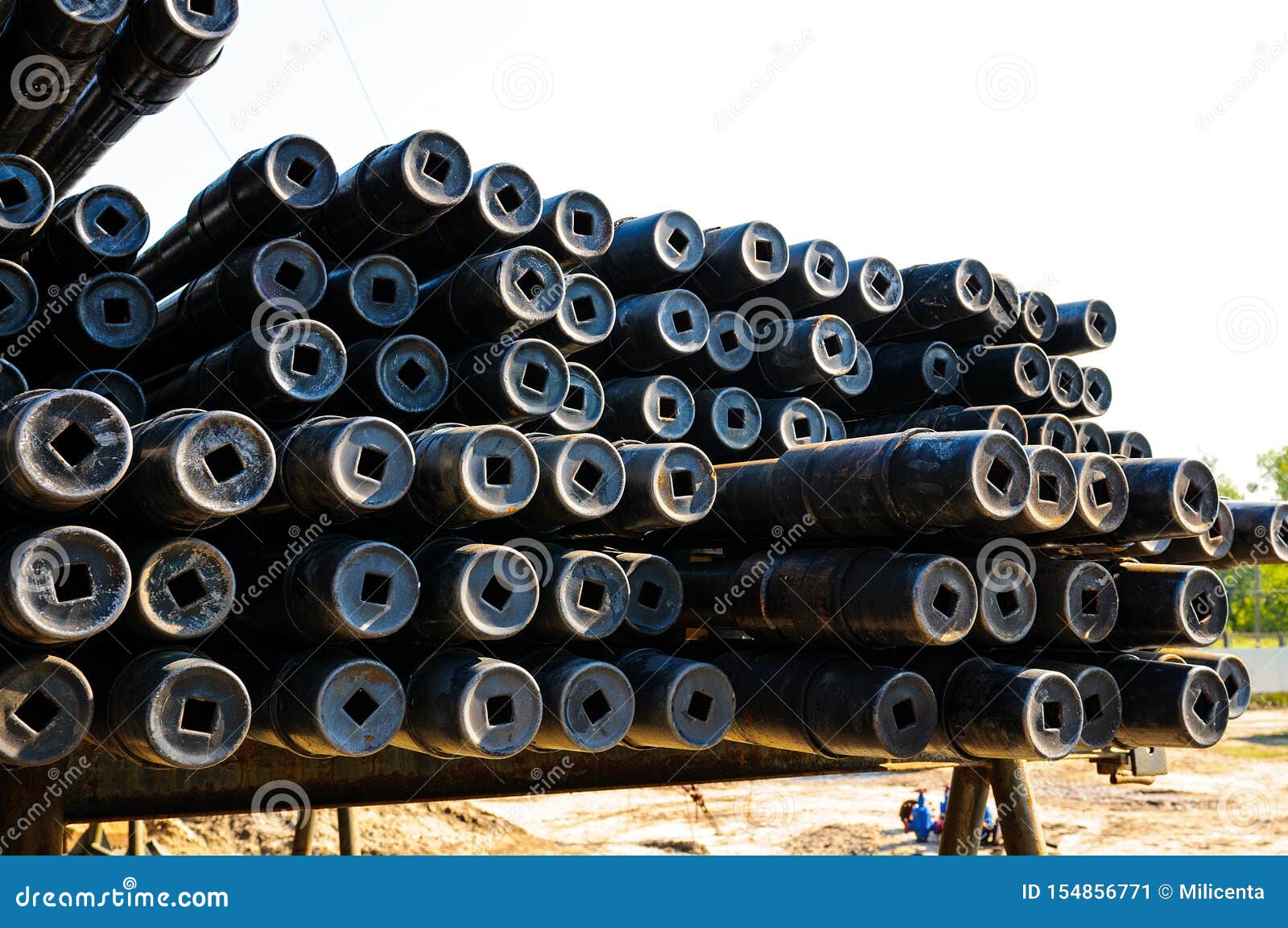 Stack of new drill pipes stock image. Image of caps - 154856771