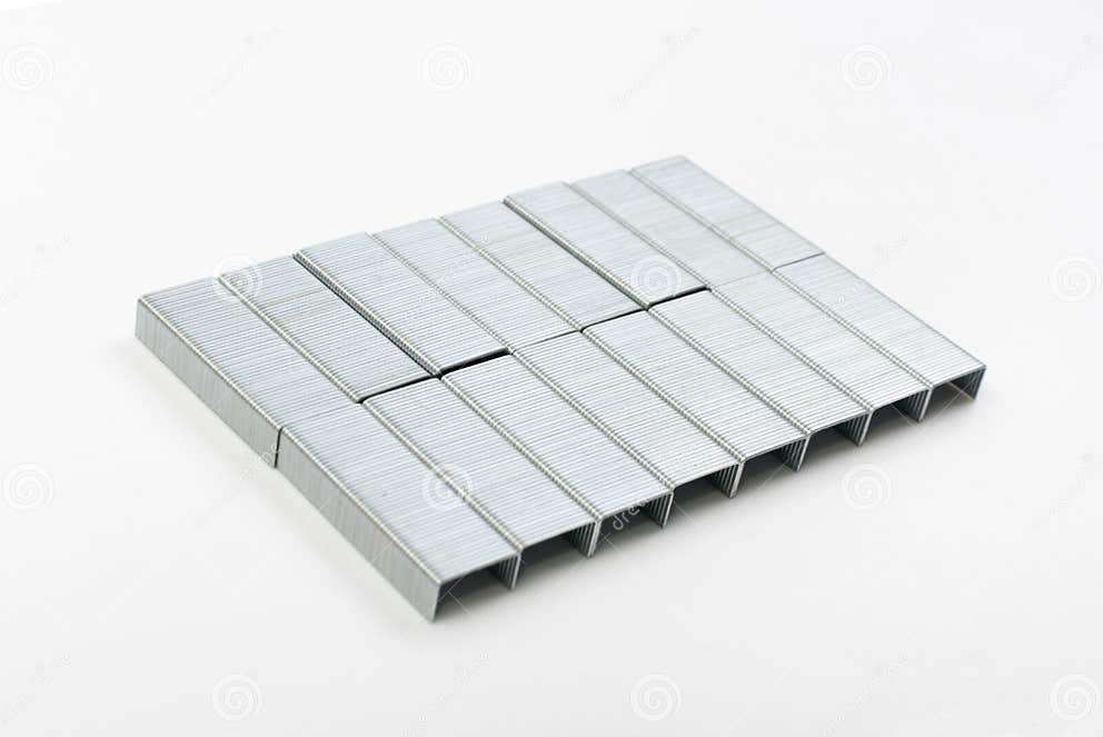 Stack of New Metal Staples for Stapler on White Stock Image - Image of ...