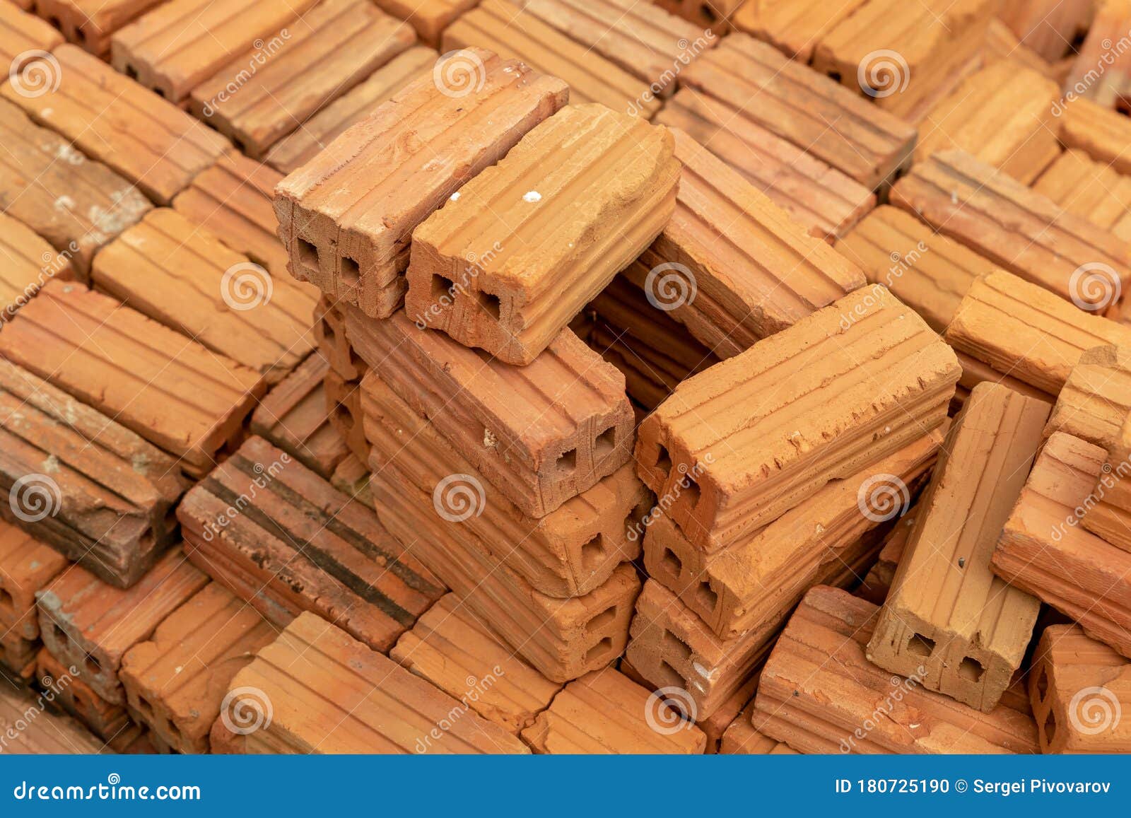 Stack of New Rectangular Bricks Red with Two Holes Background ...