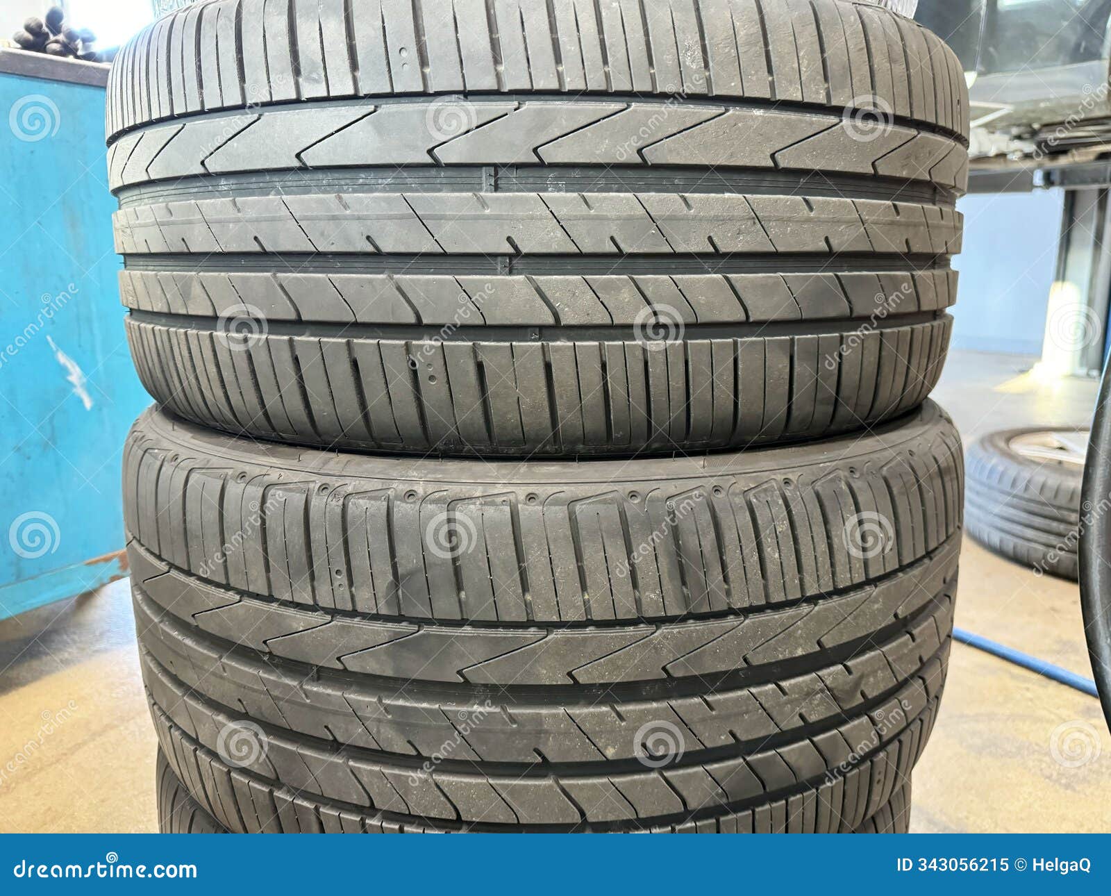 Stack of New Tires in Auto Repair Shop with Detailed Tread Patterns ...