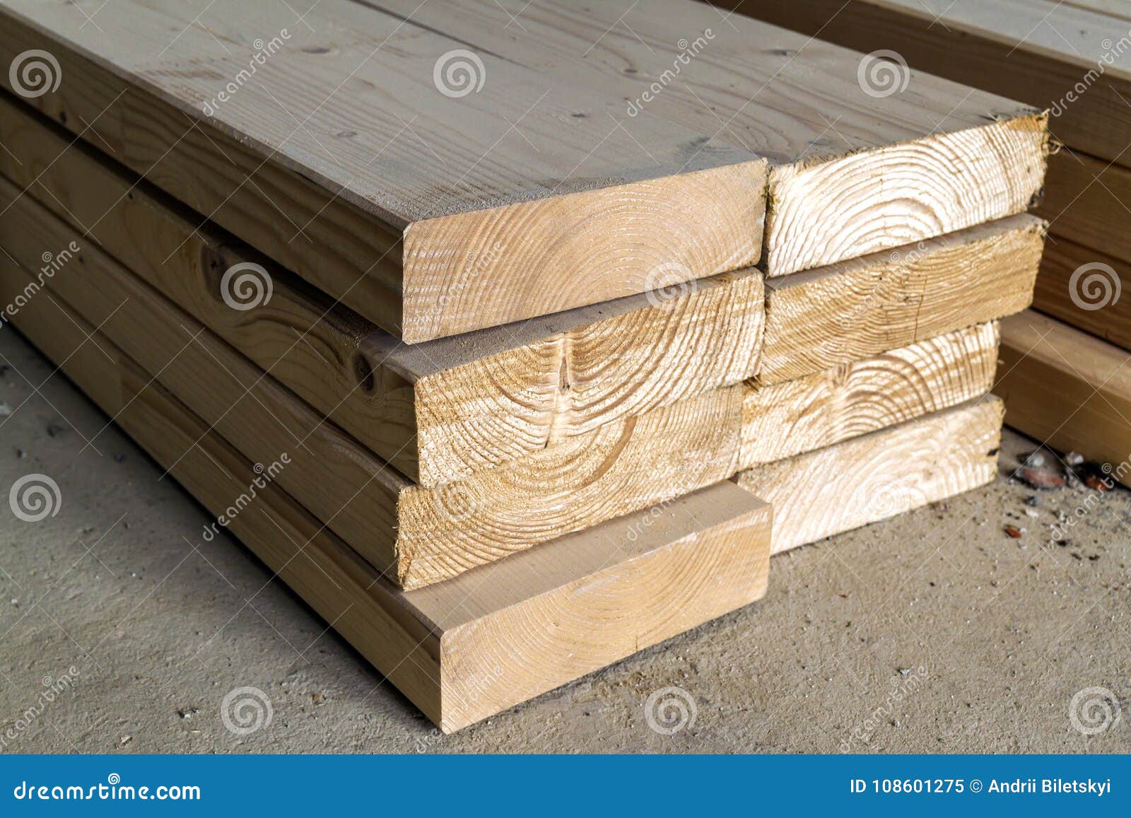 Stack of New Wooden Studs at the Lumber Yard. Wood Timber Construction ...
