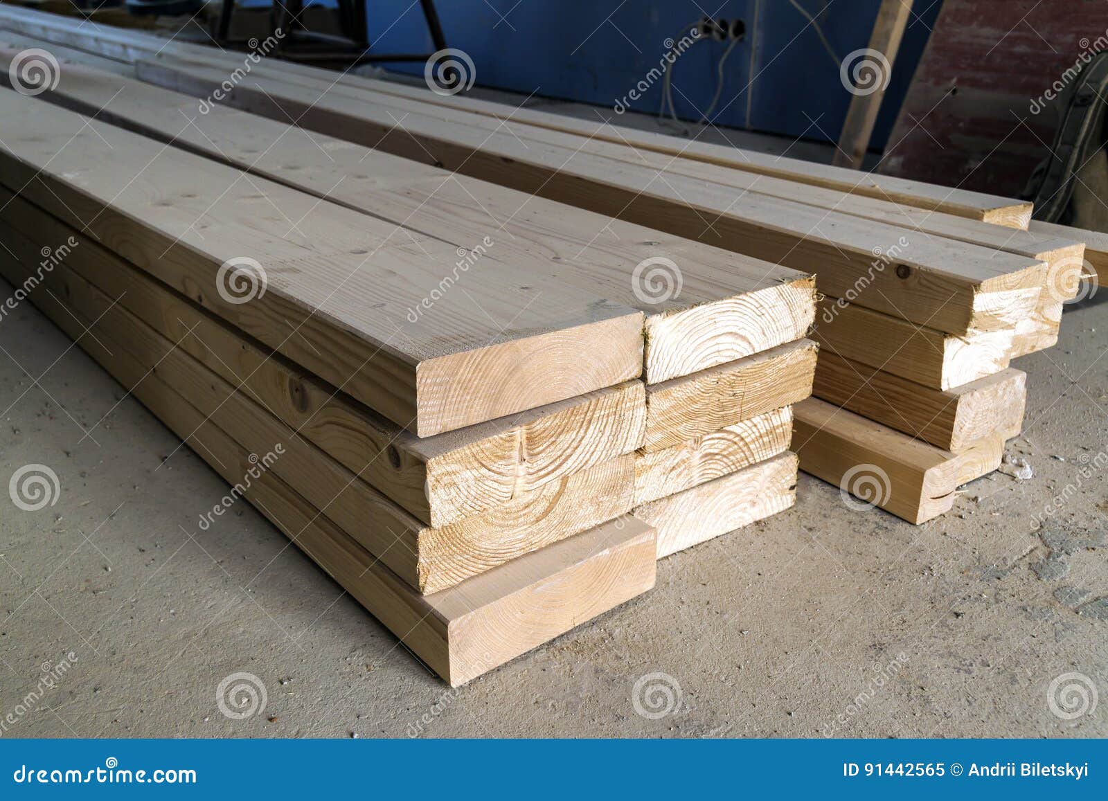 Stack of New Wooden Studs at the Lumber Yard. Wood Timber Construction ...