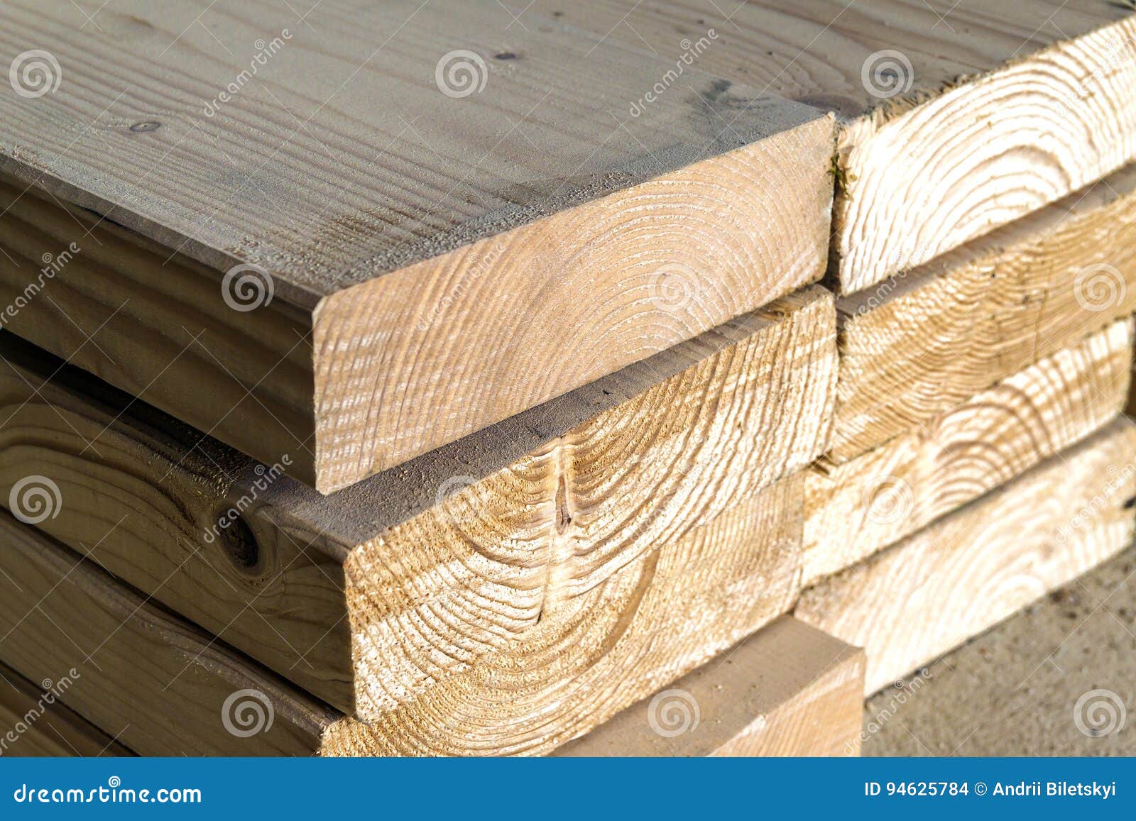 Stack of New Wooden Studs at the Lumber Yard. Wood Timber Construction ...