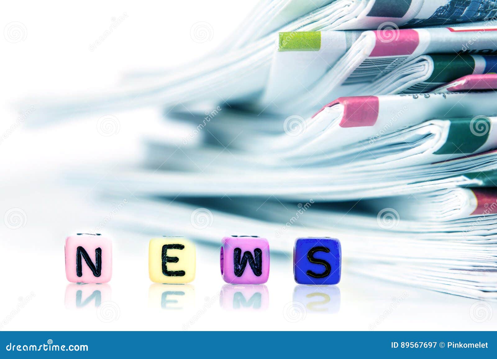 Stack of the Newspaper with Colorful Word Cube of News Stock Image ...