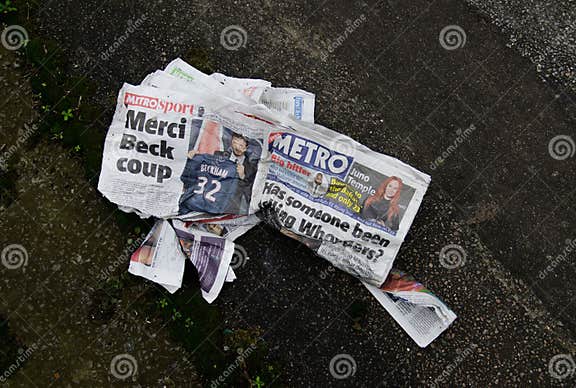Stack of Newspapers on the Pavement Outdoors Editorial Stock Photo ...
