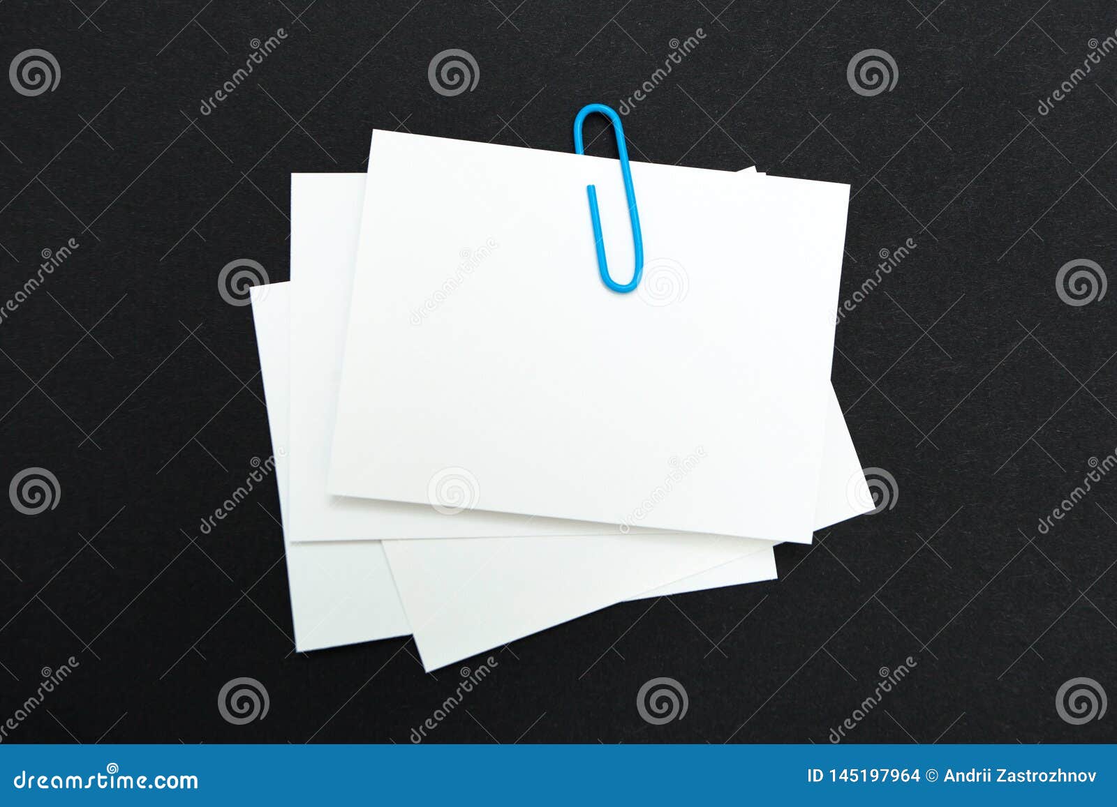 Stack of Note Paper with Blue Paperclip. Clipping Path Included Stock ...