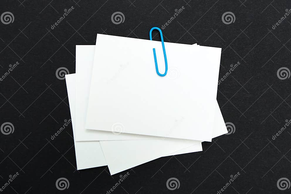 Stack of Note Paper with Blue Paperclip. Clipping Path Included Stock ...
