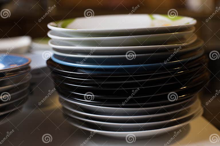 Stack of Odd Plates in Kitchen Stock Image - Image of closeup, plate ...