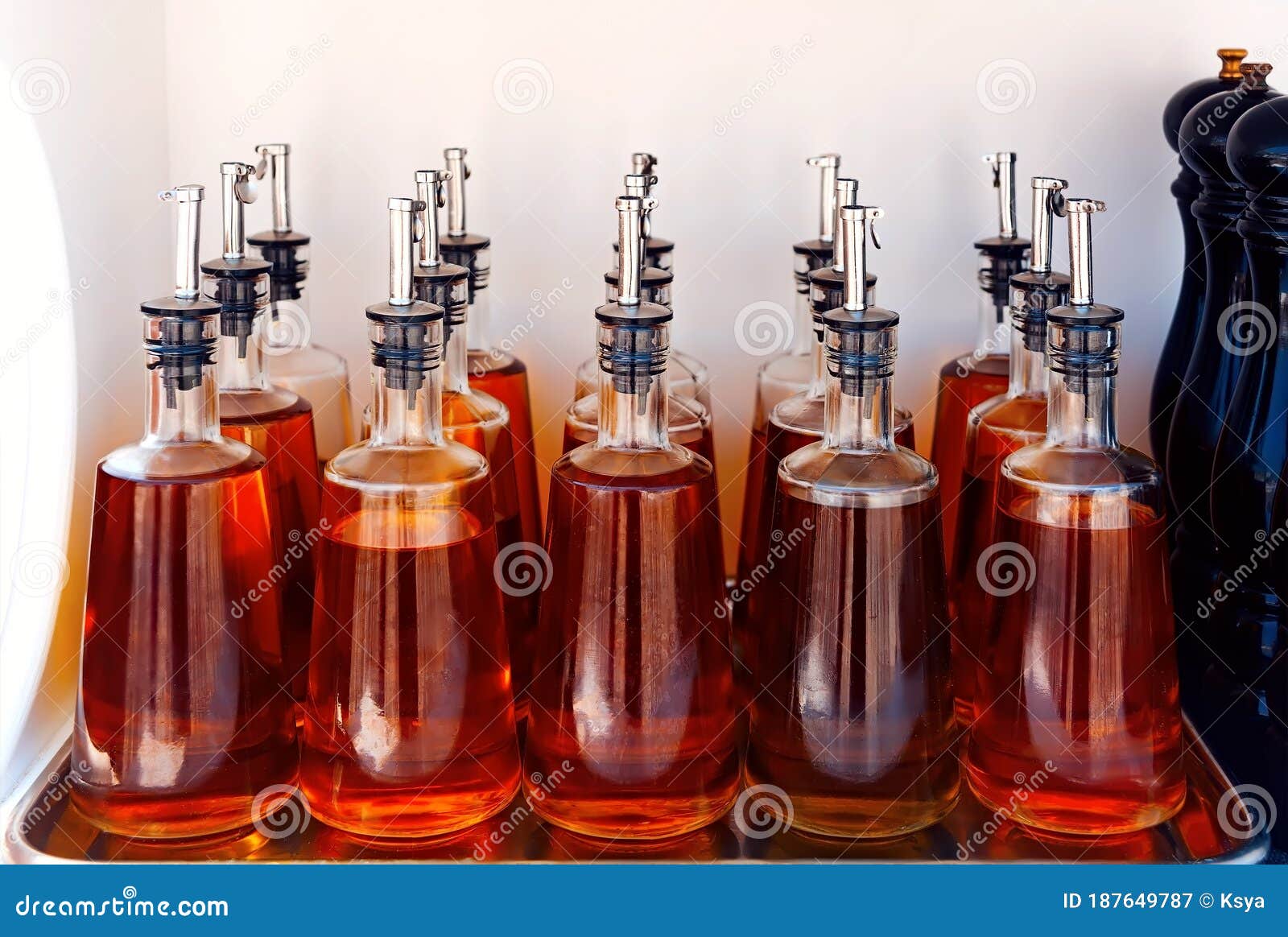 Stack of Oil Bottles on a Tray Stock Image - Image of arrangement ...