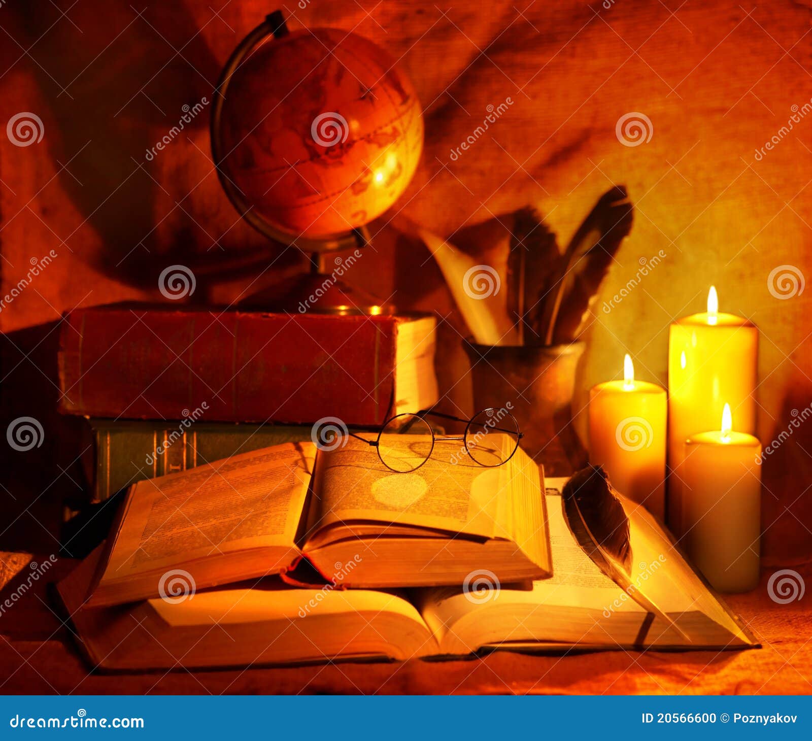 Stack old book and candle. stock photo. Image of history - 20566600
