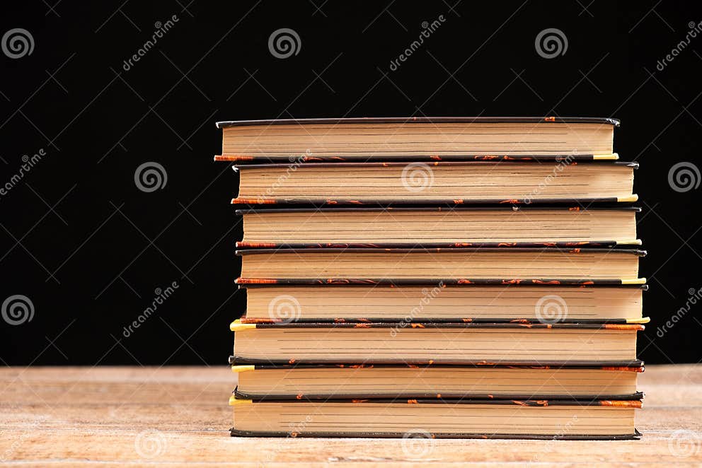 Stack of Old Books on a Black Background. Wisdom and Knowledge, Love of ...