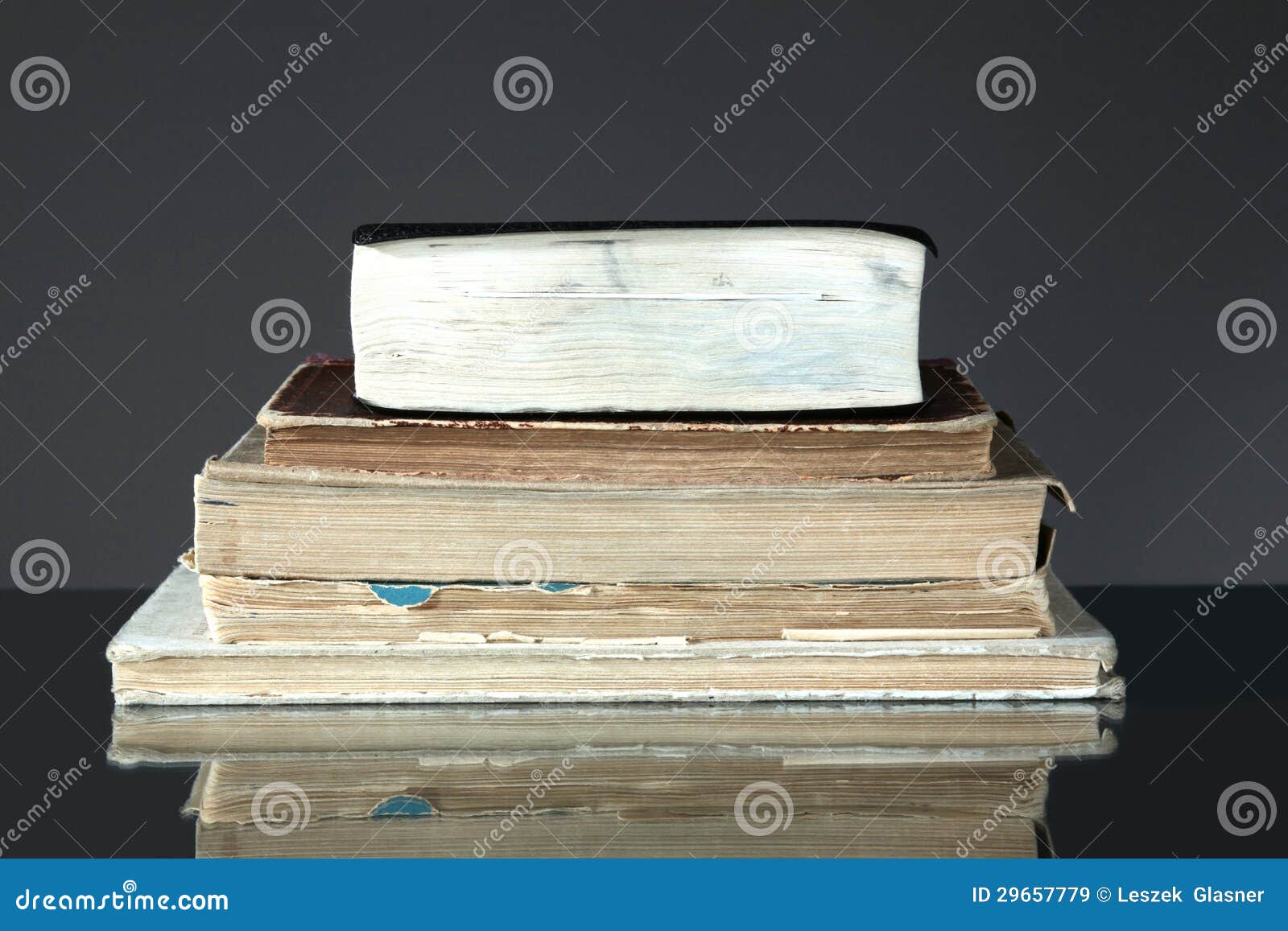 Stack of old books on dark stock image. Image of background - 29657779
