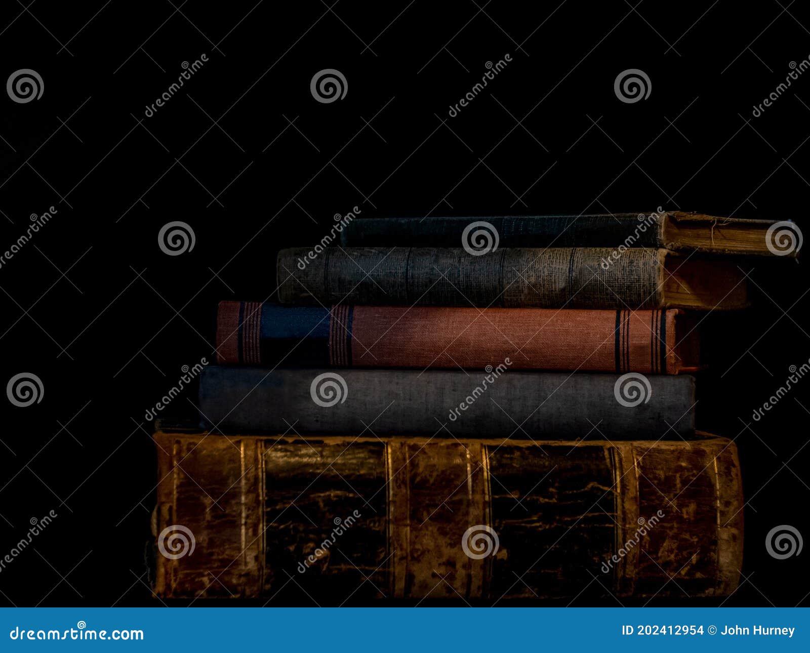 Stack of Old Books with Shadow and Black Background Stock Photo - Image ...