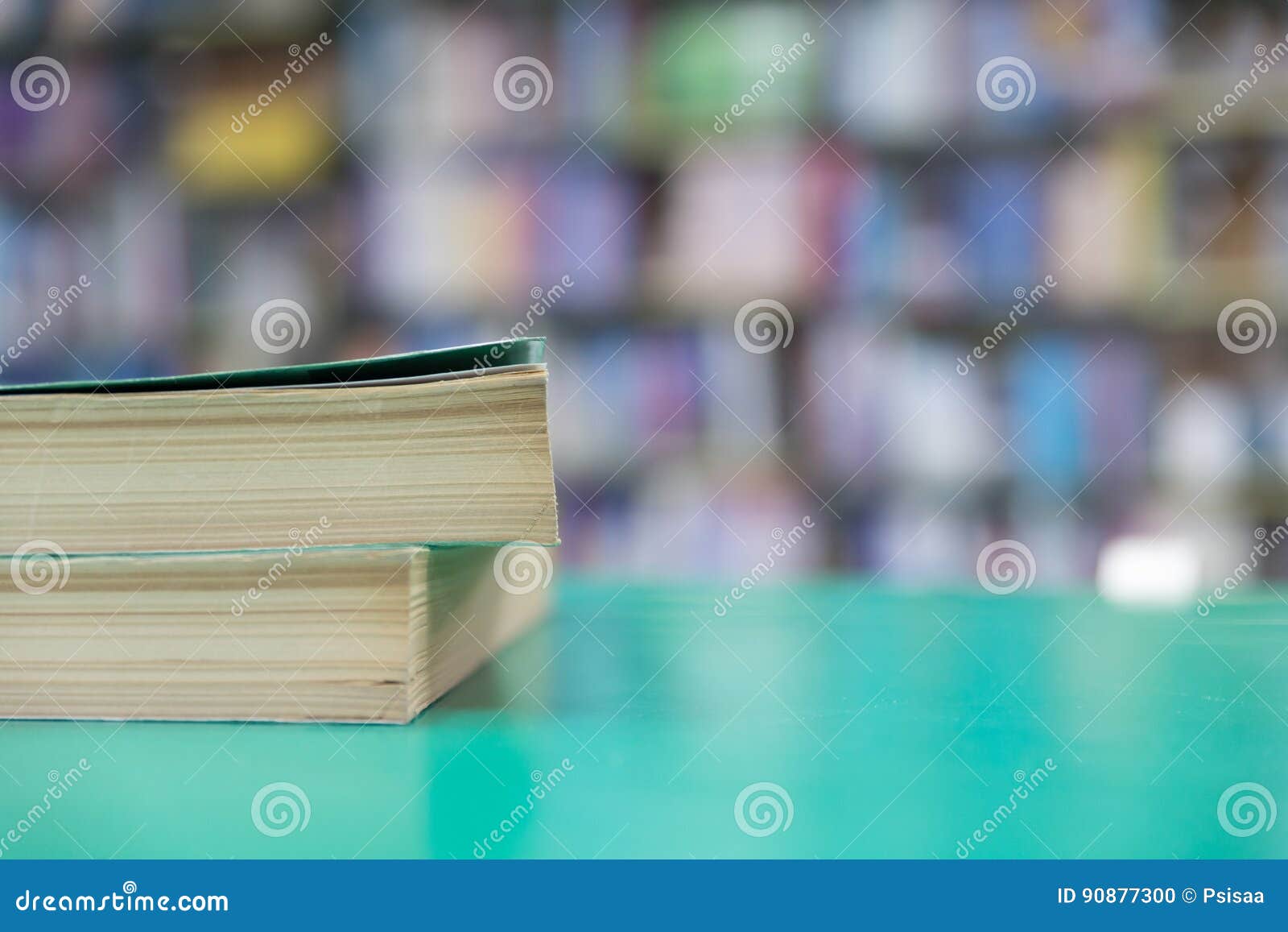 A Stack of Old Books on Table with Blur Book in Library, Education ...