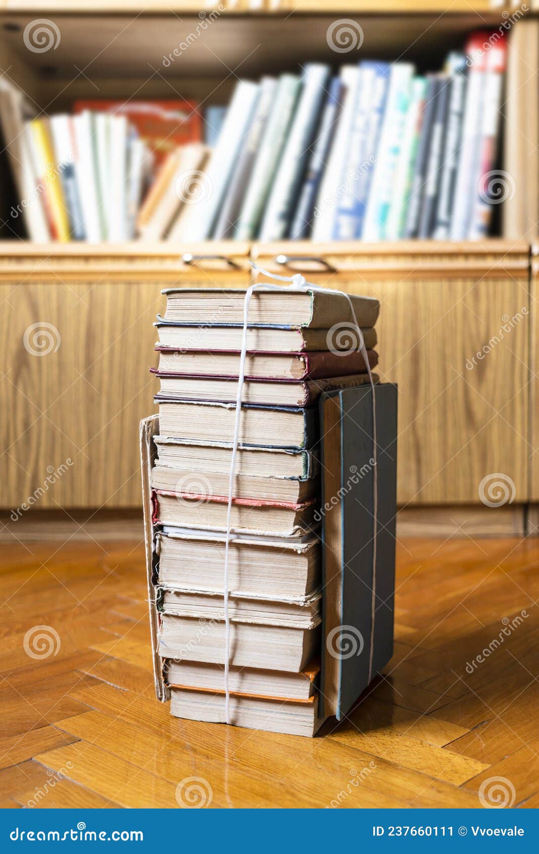 Stack of Old Books Tied with Rope on Parquet Floor Stock Image - Image ...