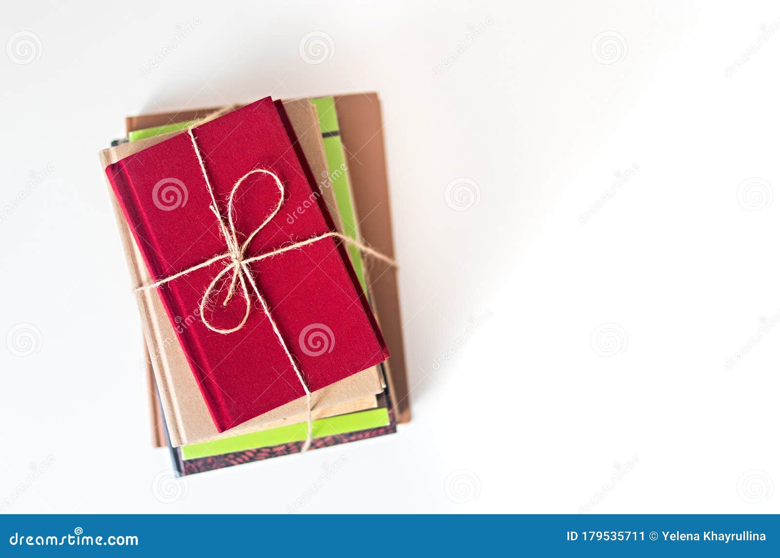 Stack of Old Books Tied with String on a White Background Stock Image ...