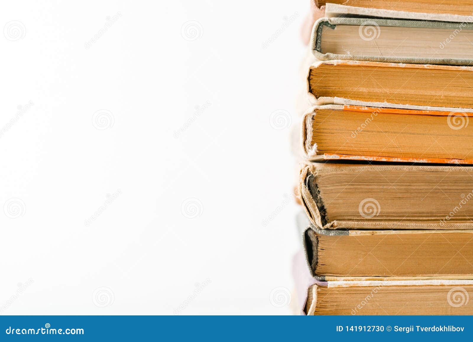 A Stack of Old Books. Yellow Frayed Pages. Worn Damaged Book Covers ...
