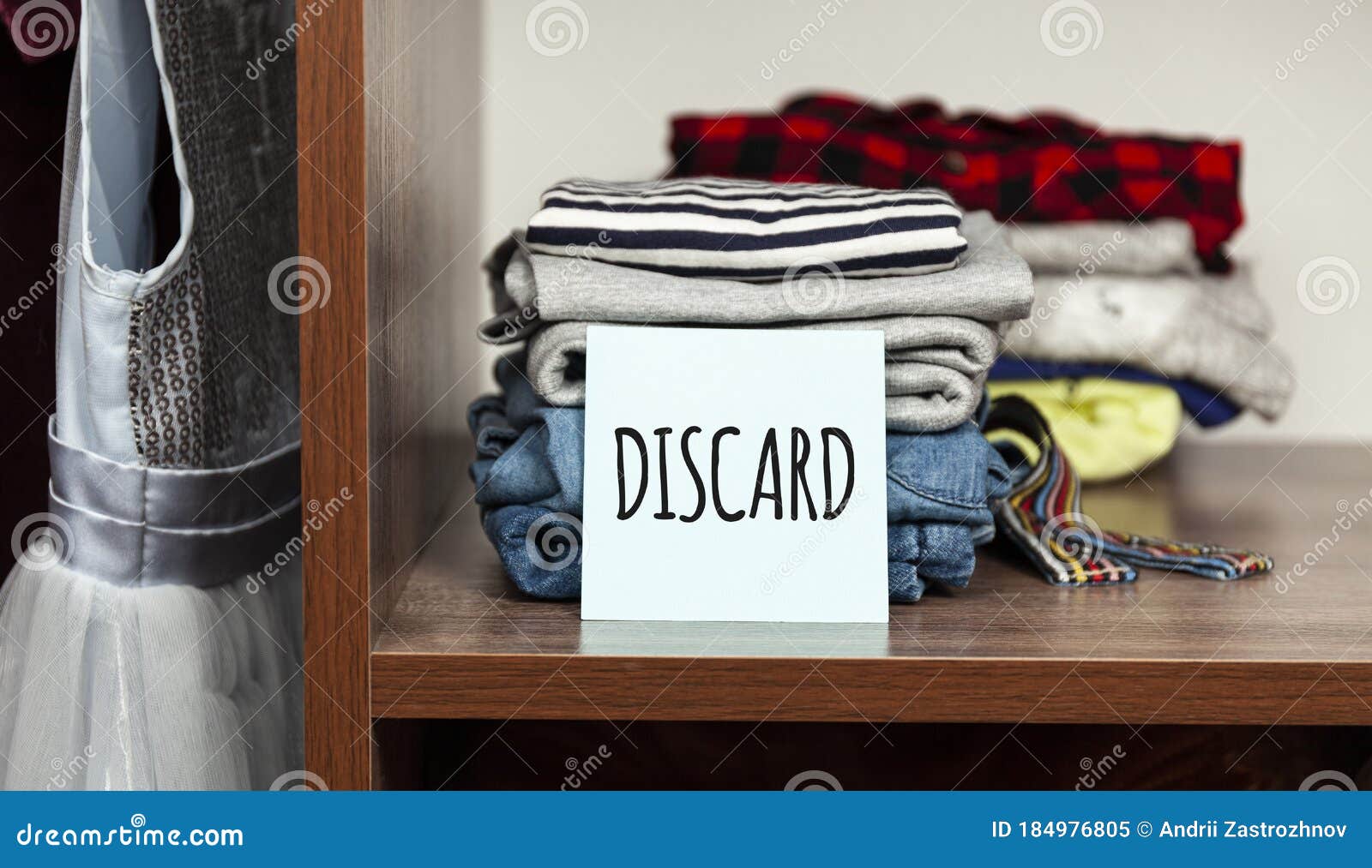 Stack of Old Clothes To Discard Declutter or Donate. Recycling Fabric ...