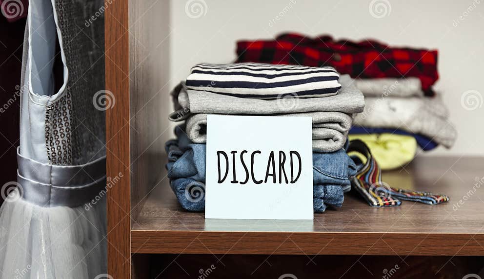 Stack of Old Clothes To Discard Declutter or Donate. Recycling Fabric ...