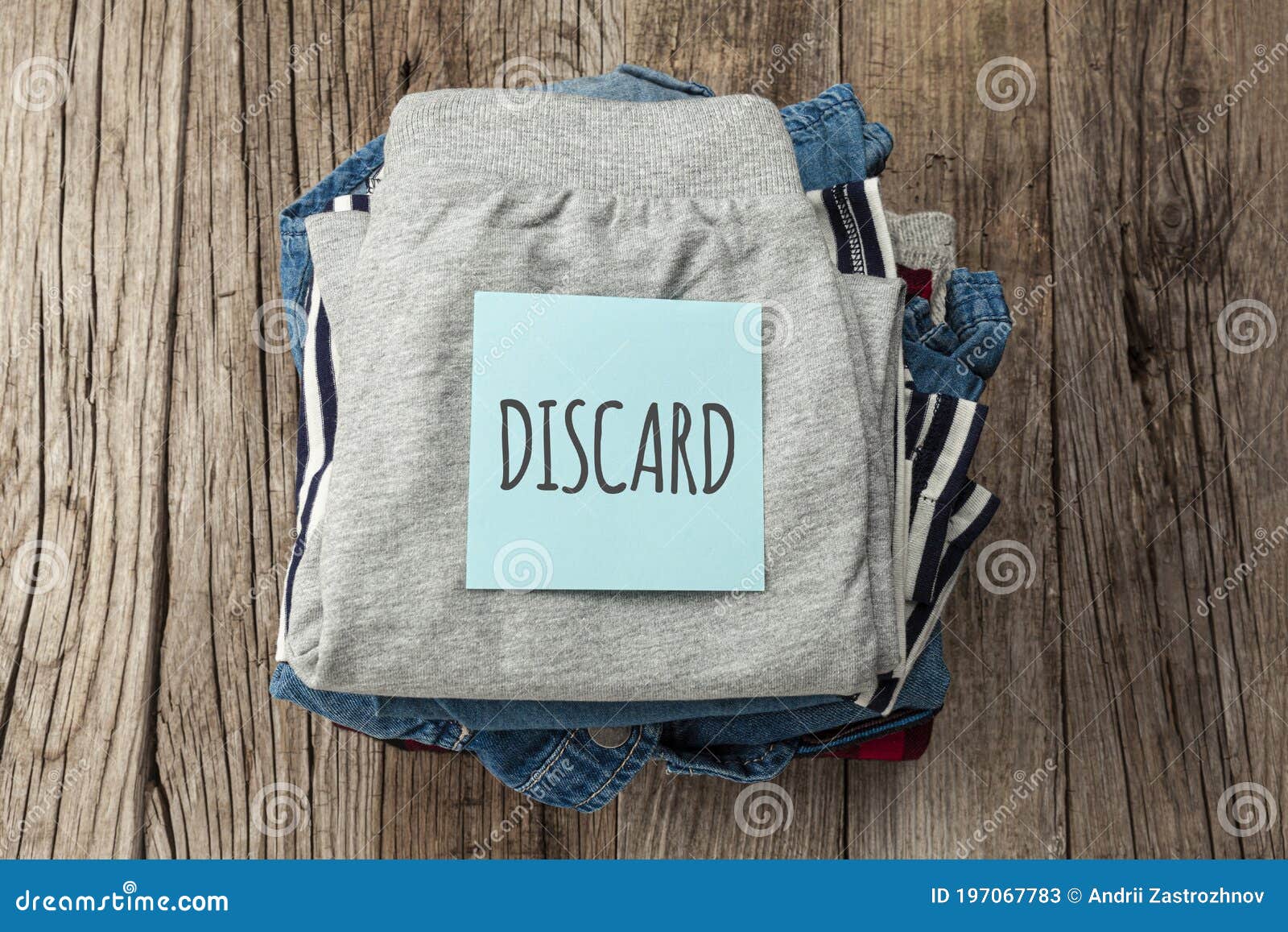 Stack of Old Clothes To Discard Declutter or Donate. Recycling Fabric ...