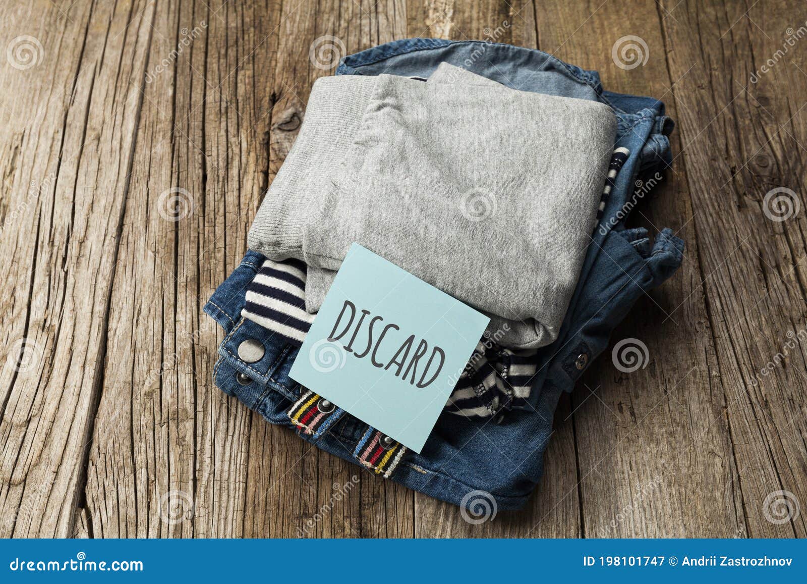 Stack of Old Clothes To Discard Declutter or Donate. Recycling Fabric ...