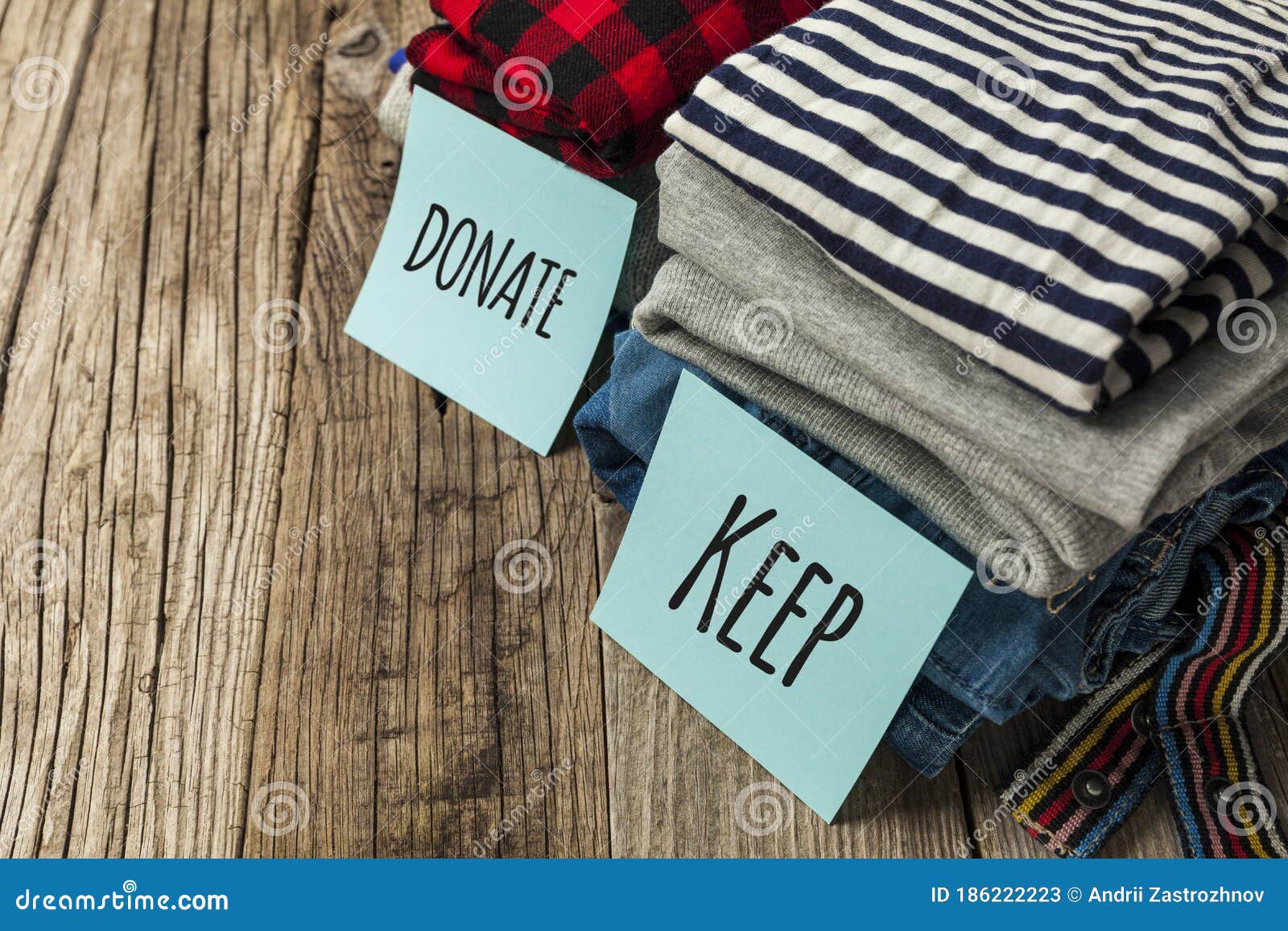 Stack of Old Clothes To Discard Declutter or Keep. Recycle Clothes, Eco ...