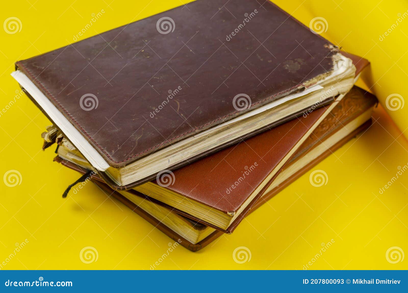 Stack of Old Diaries Lying on Yellow Background Stock Image - Image of ...