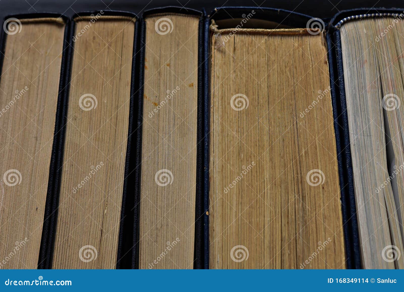 A Stack of Old Dusty Books Stacked on Top of Each Other Stock Photo ...