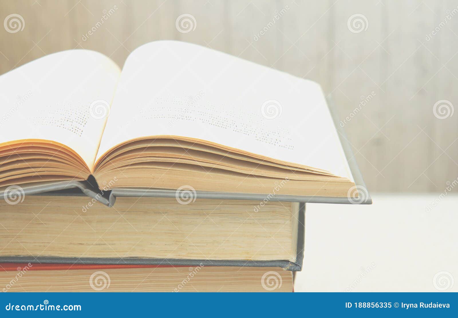 Stack of Old Hardback Books and Open Book. Many Books Piles. Hardback ...