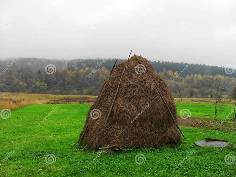 Haystack in the Field Near the Farm in Autumn Stock Image - Image of ...