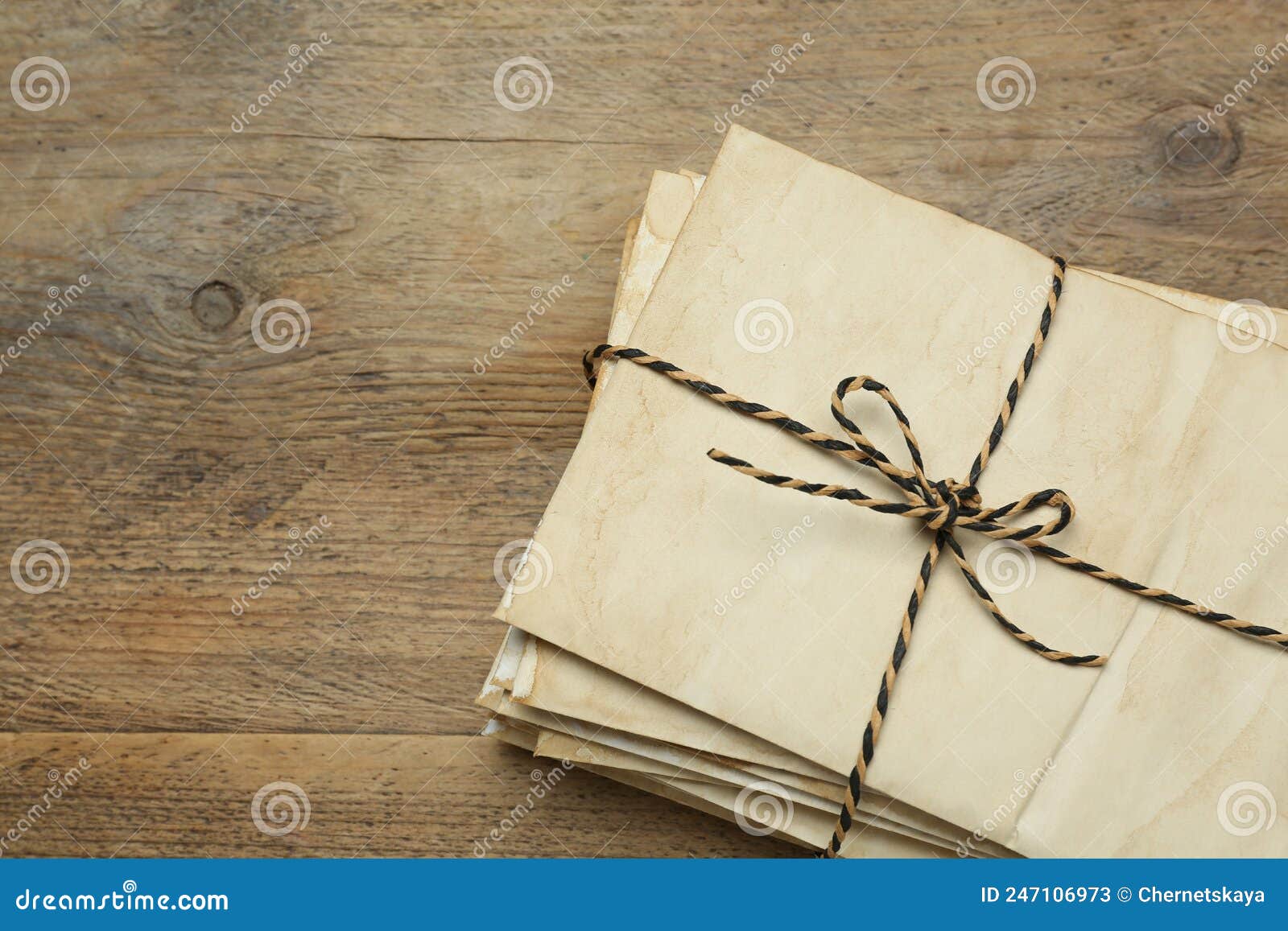Stack of Old Letters Tied with String on Wooden Table, Top View. Space ...