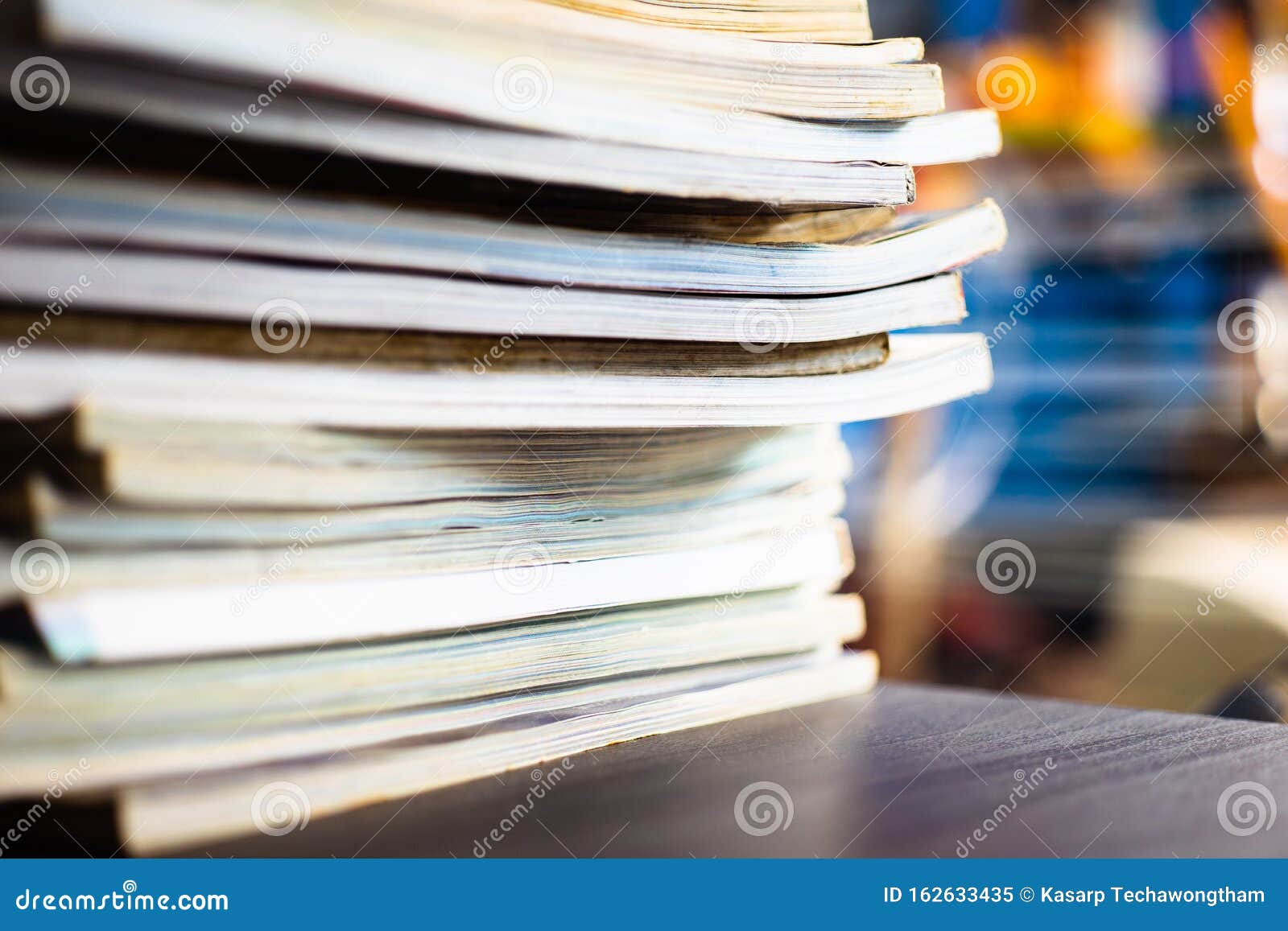 Stack of Old Magazines or Books on on Black Laptop Desk Background ...