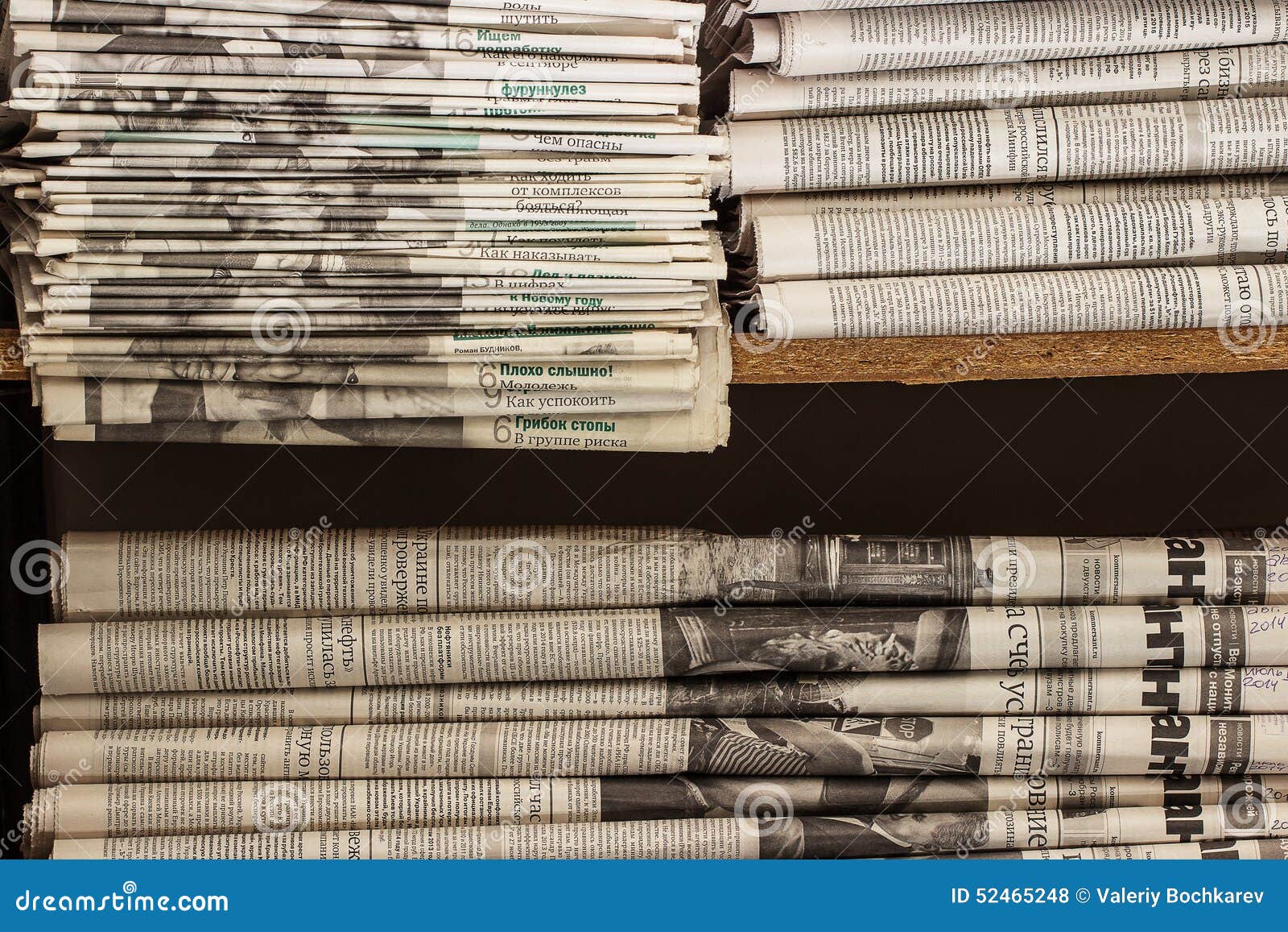 A Stack of Old Newspapers Lie on the Shelf Stock Photo - Image of ...