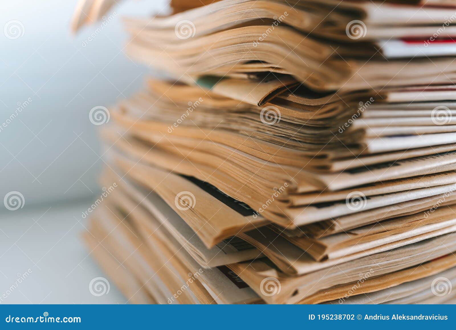 Stack of old newspapers stock photo. Image of abstract - 195238702