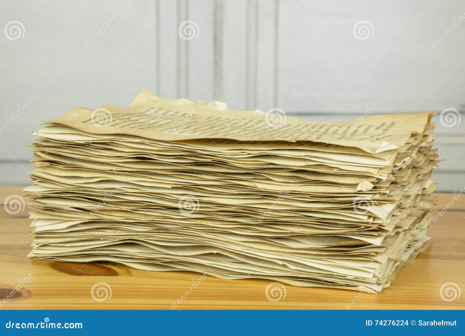 Stack of Old Paper Sheets on Wooden Table Stock Photo - Image of ...