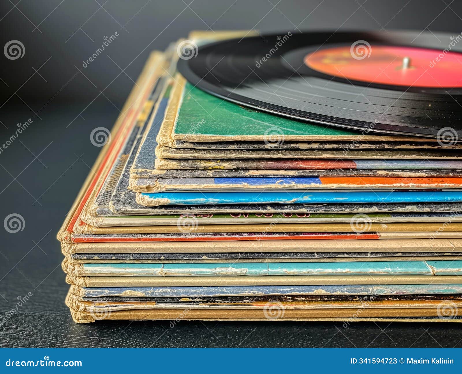 A Stack of Old Records with a Red and White One on Top Stock Image ...