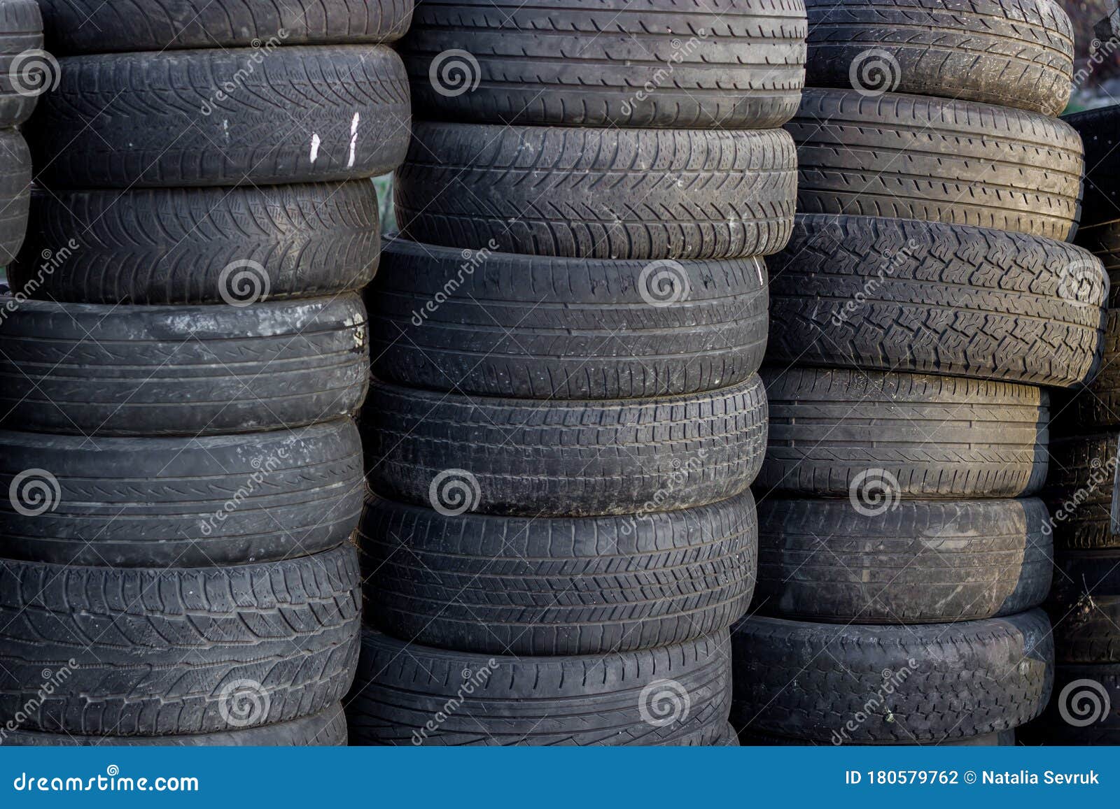 A Stack of Old Rubber Wheels Stock Photo - Image of warehouse, tires ...