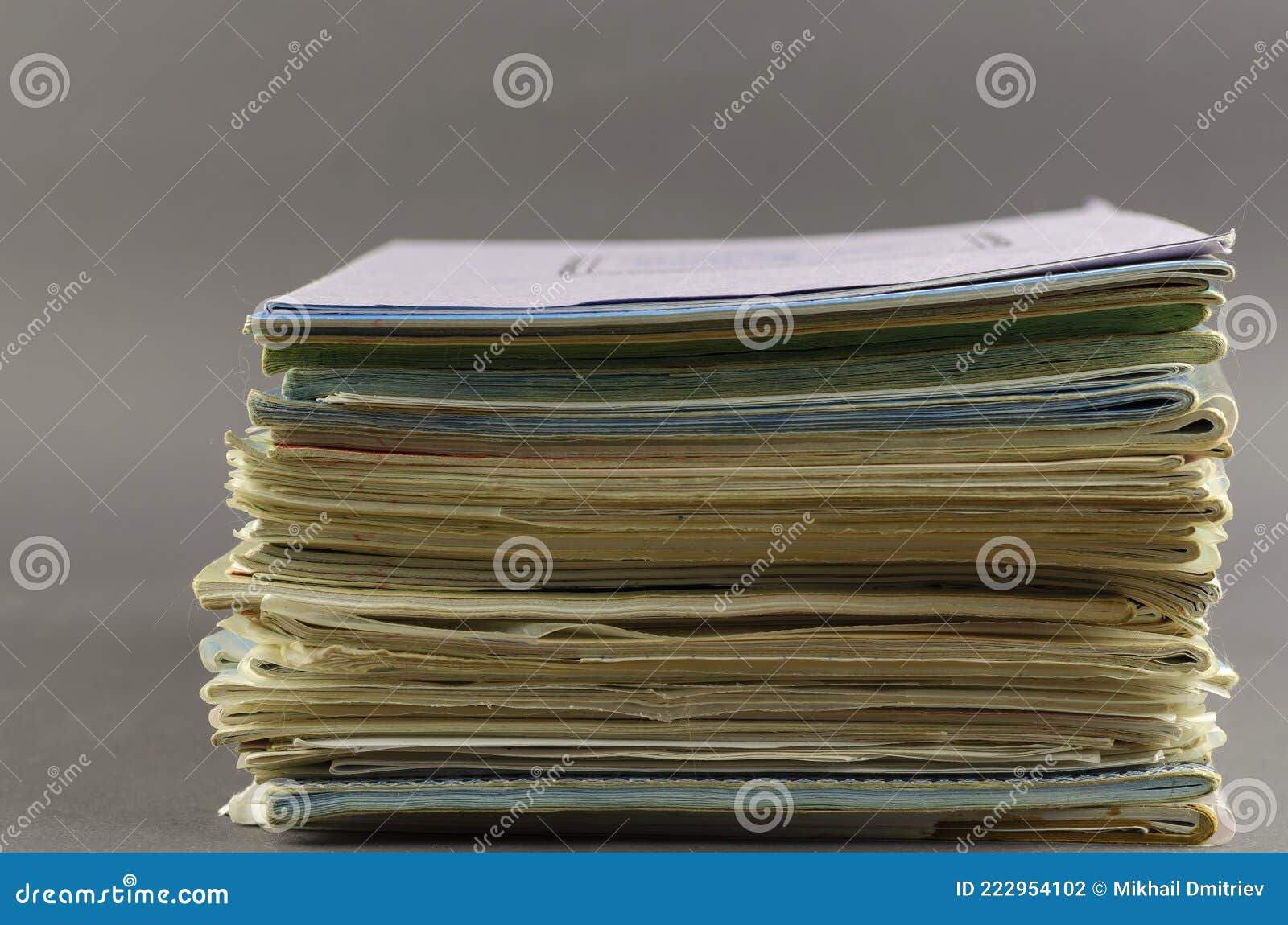 Stack of Old School Exercise Books on a Gray Background Stock Photo ...