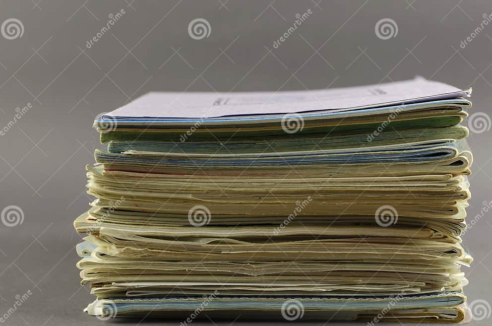 Stack of Old School Exercise Books on a Gray Background Stock Photo ...