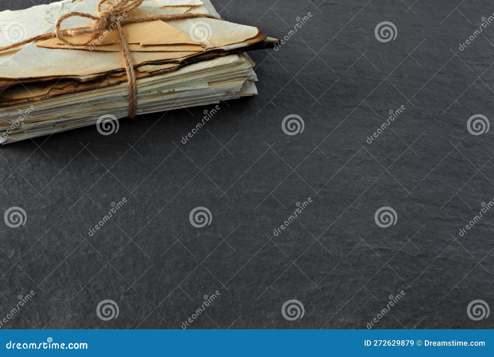 Stack of Old Torn Vintage Letters on Yellowed Paper Against Black ...