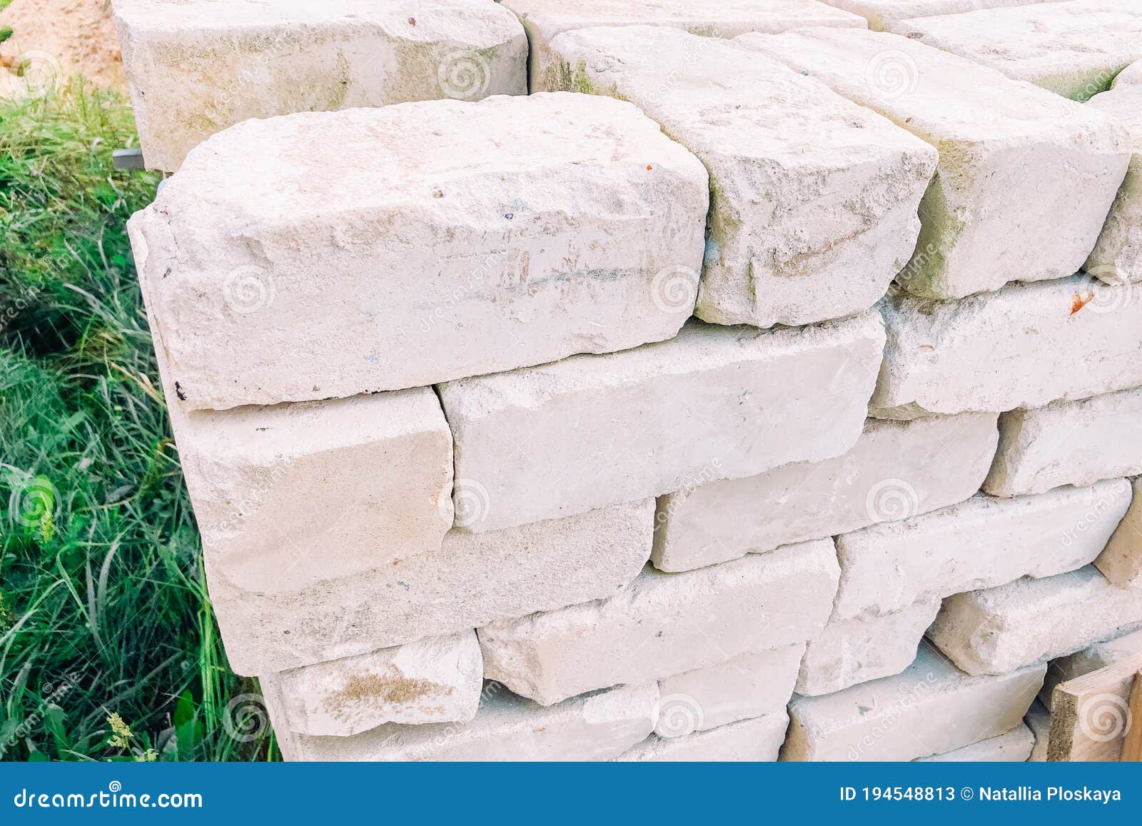 Stack of old white bricks stock image. Image of surface - 194548813