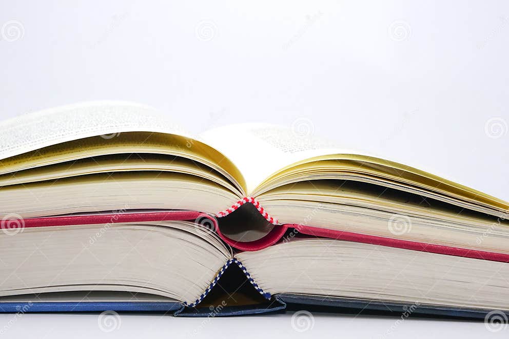 Stack of Open Books and Stacked Together. Knowledge and Education ...